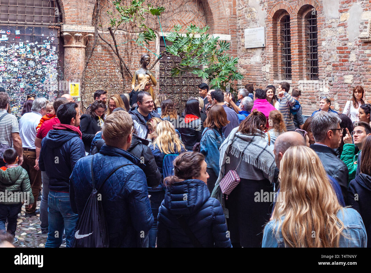 Verona, Italy – March 2019. Statue of Juliet in garden of Gothic-style ...