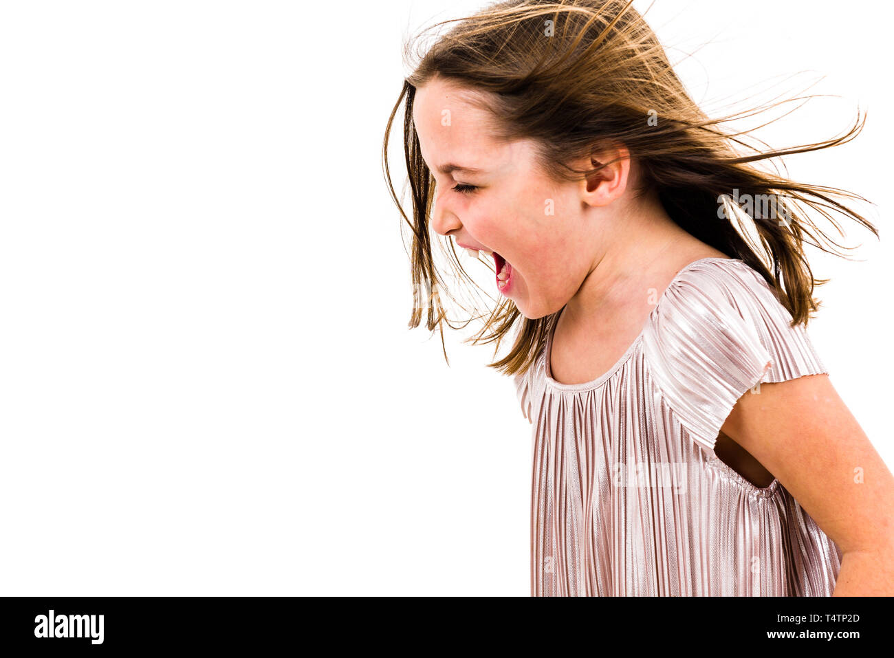 Little girl child yelling, shouting and screaming with bad manners. Angry upset girl is arguing ...