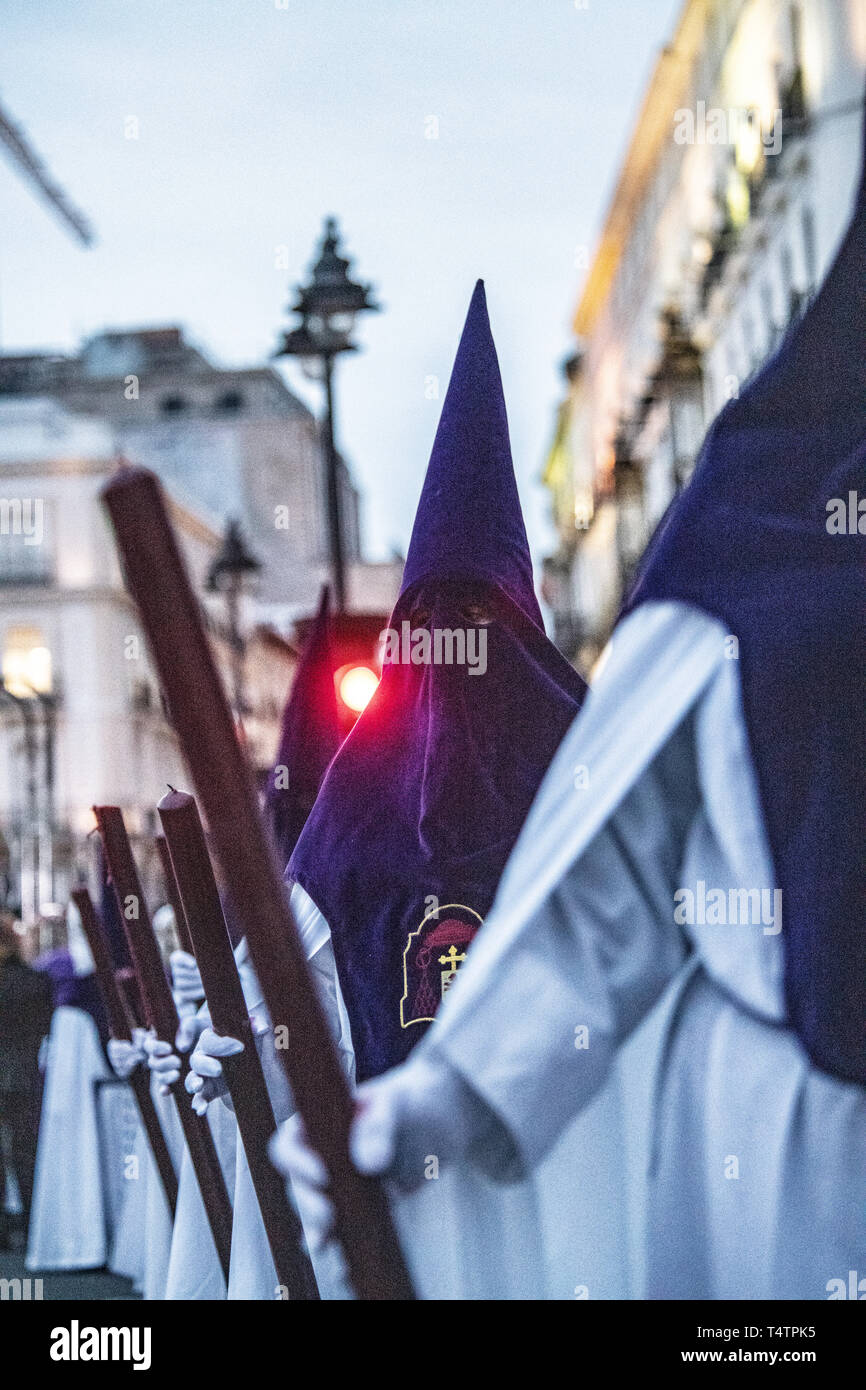 Nazarenos” march with their paso (christ effigy) through the streets of ...