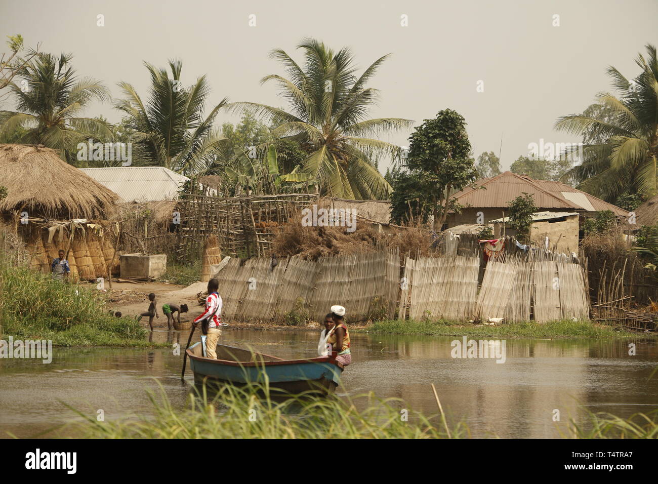 Countryside in Togo, transport by boat over the river Stock Photo - Alamy