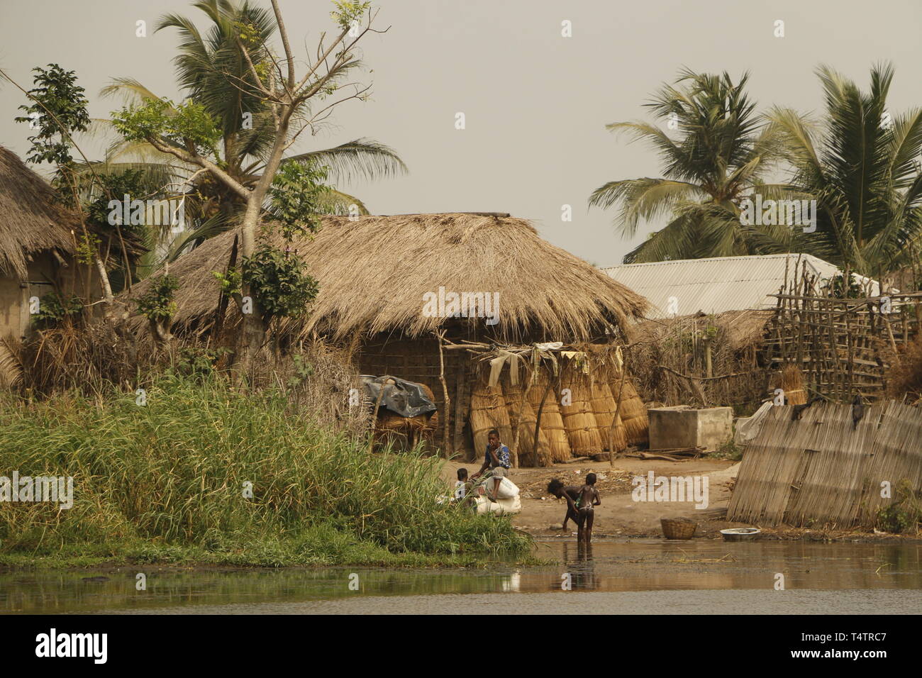 Countryside in Togo, Washing in the river Stock Photo - Alamy