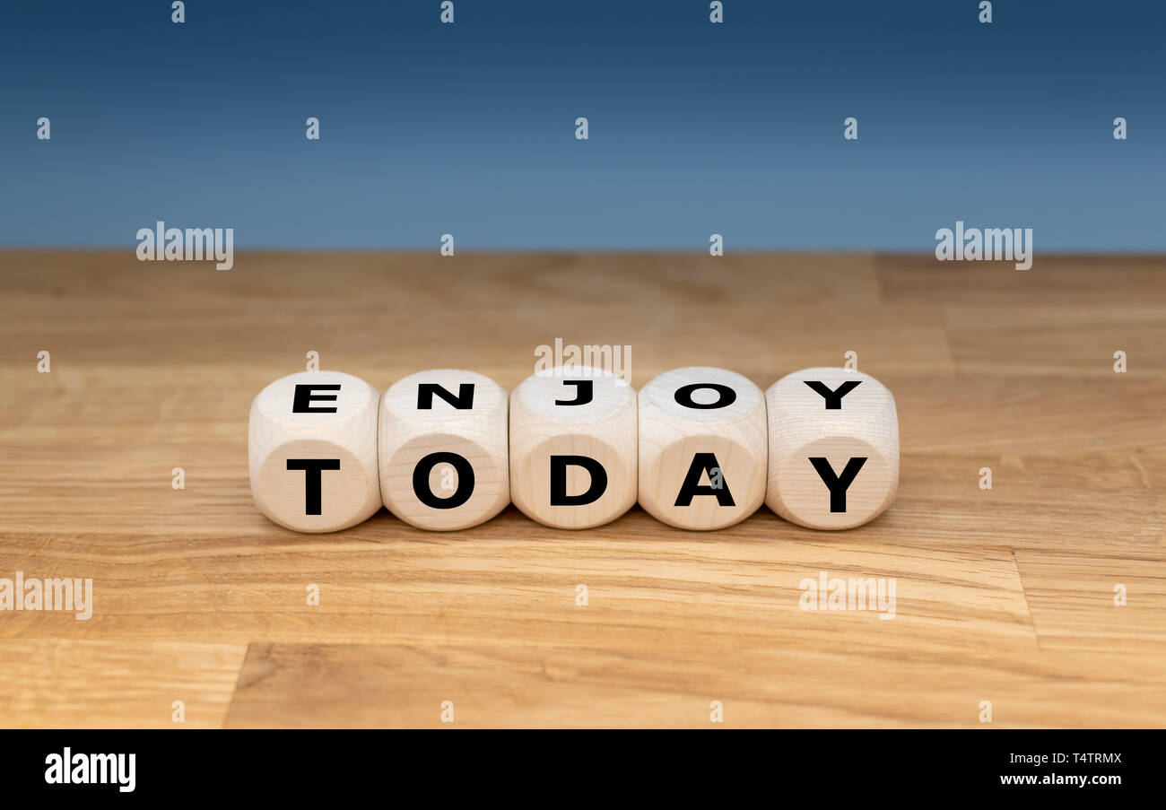 Dice form the words "ENJOY TODAY Stock Photo - Alamy