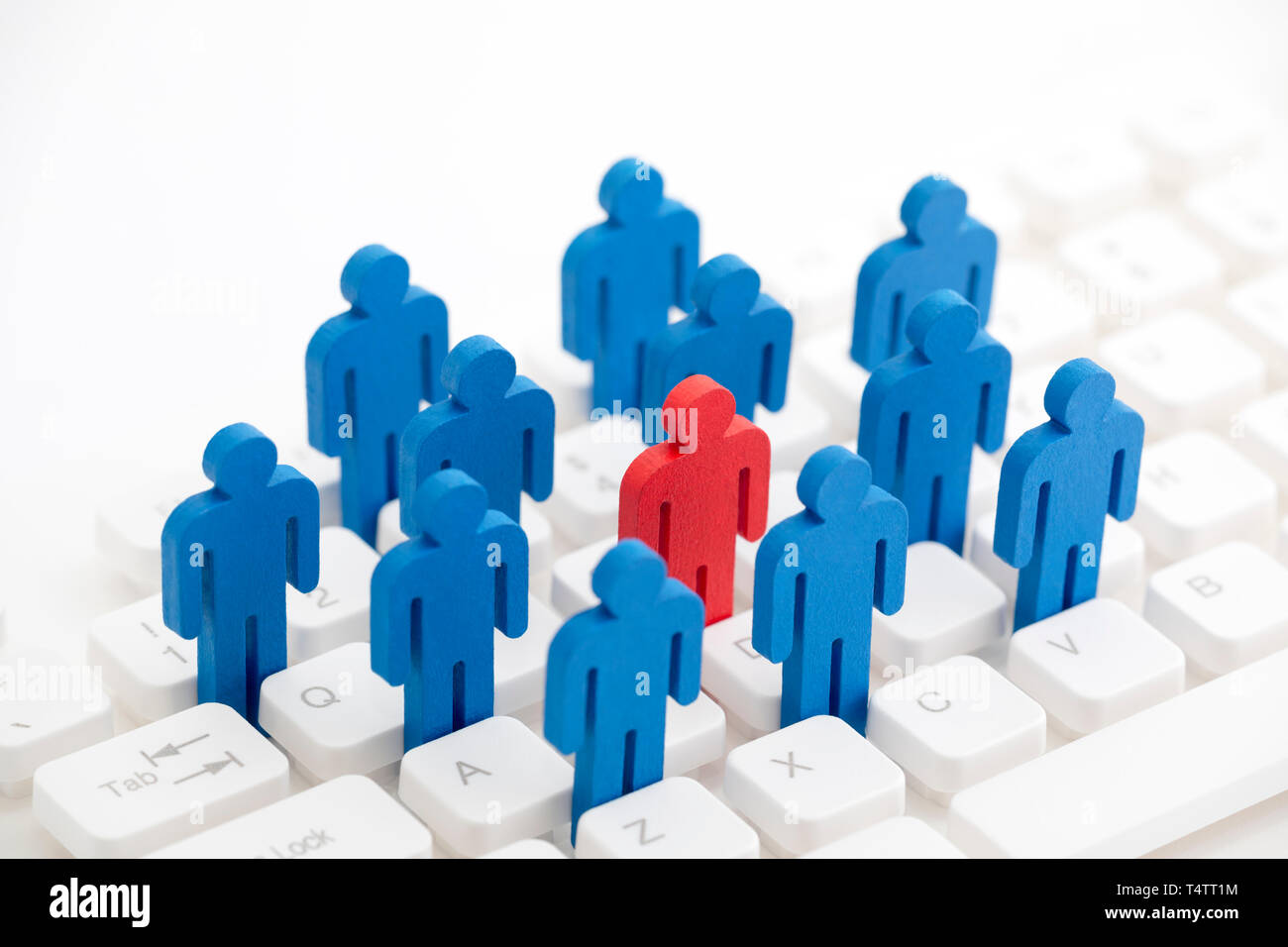 Unique person in the crowd on computer keyboard Stock Photo - Alamy