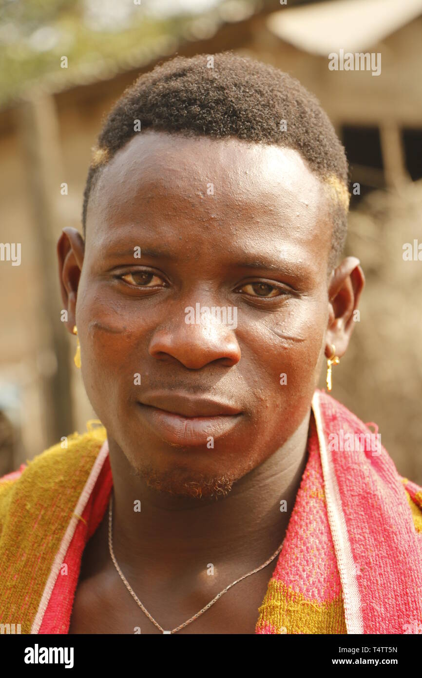 Countryside in Togo, Portrait of a man with a different hairstyle Stock ...