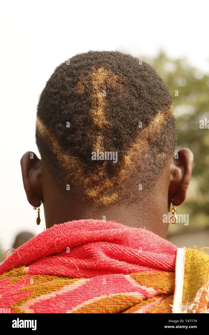 Countryside in Togo, Portrait of a man with a different hairstyle Stock ...