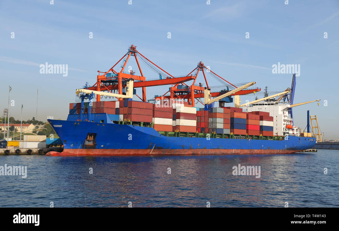 Container Ship is loading in a port Stock Photo - Alamy