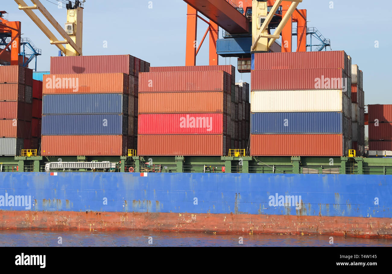 Container Ship is loading in a port Stock Photo - Alamy