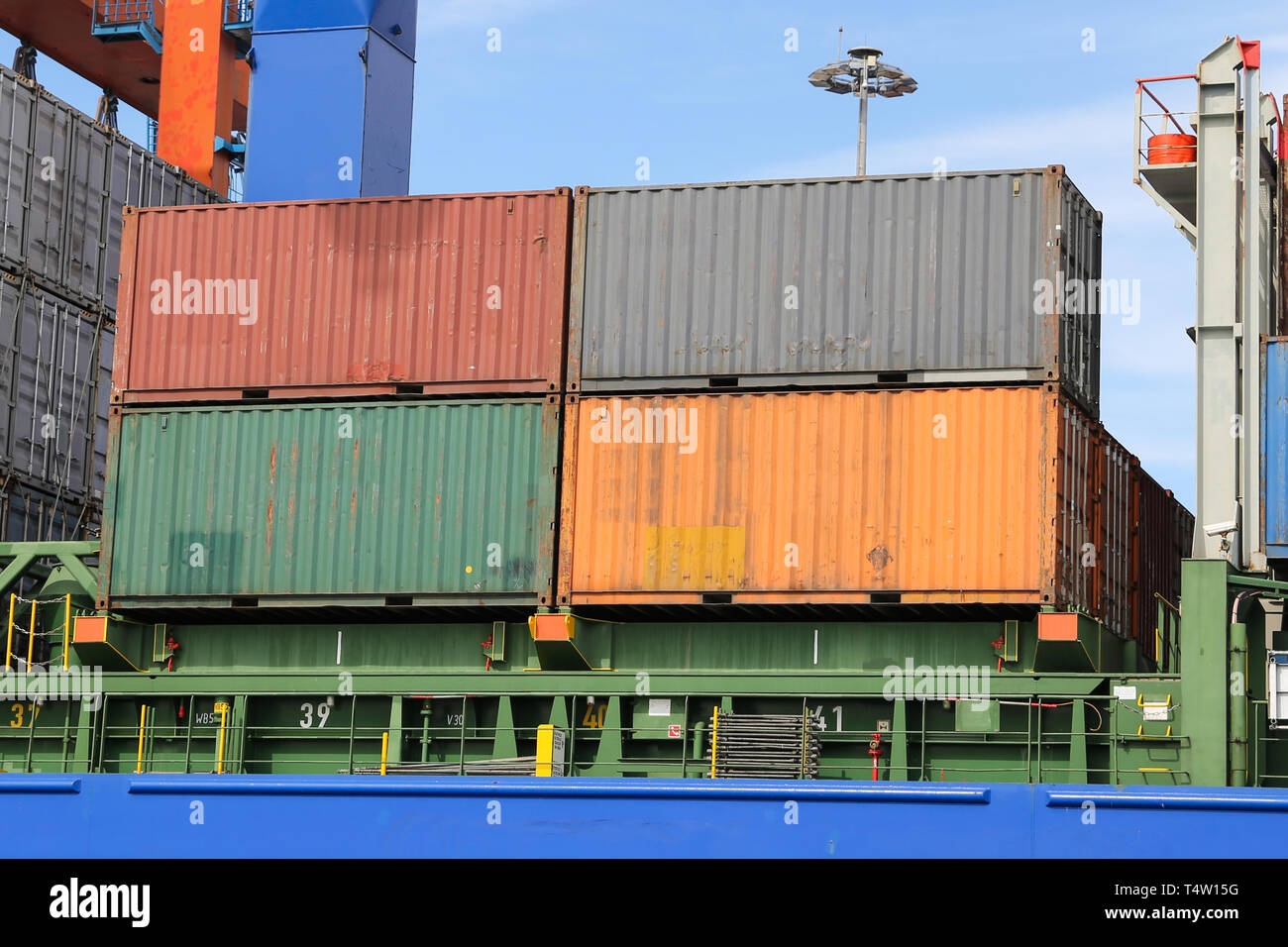 Container Ship is loading in a port Stock Photo - Alamy