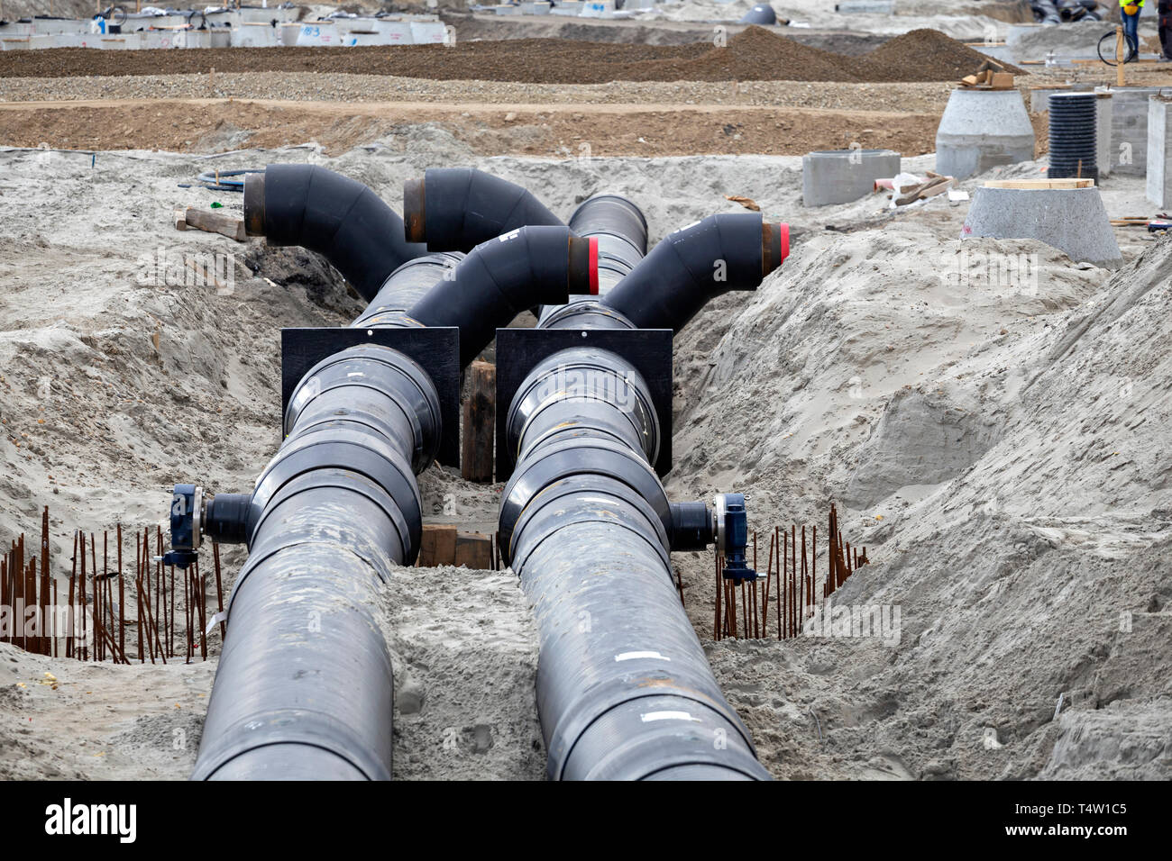 Laying of a new energy pipeline. Work on the pipe construction Stock ...