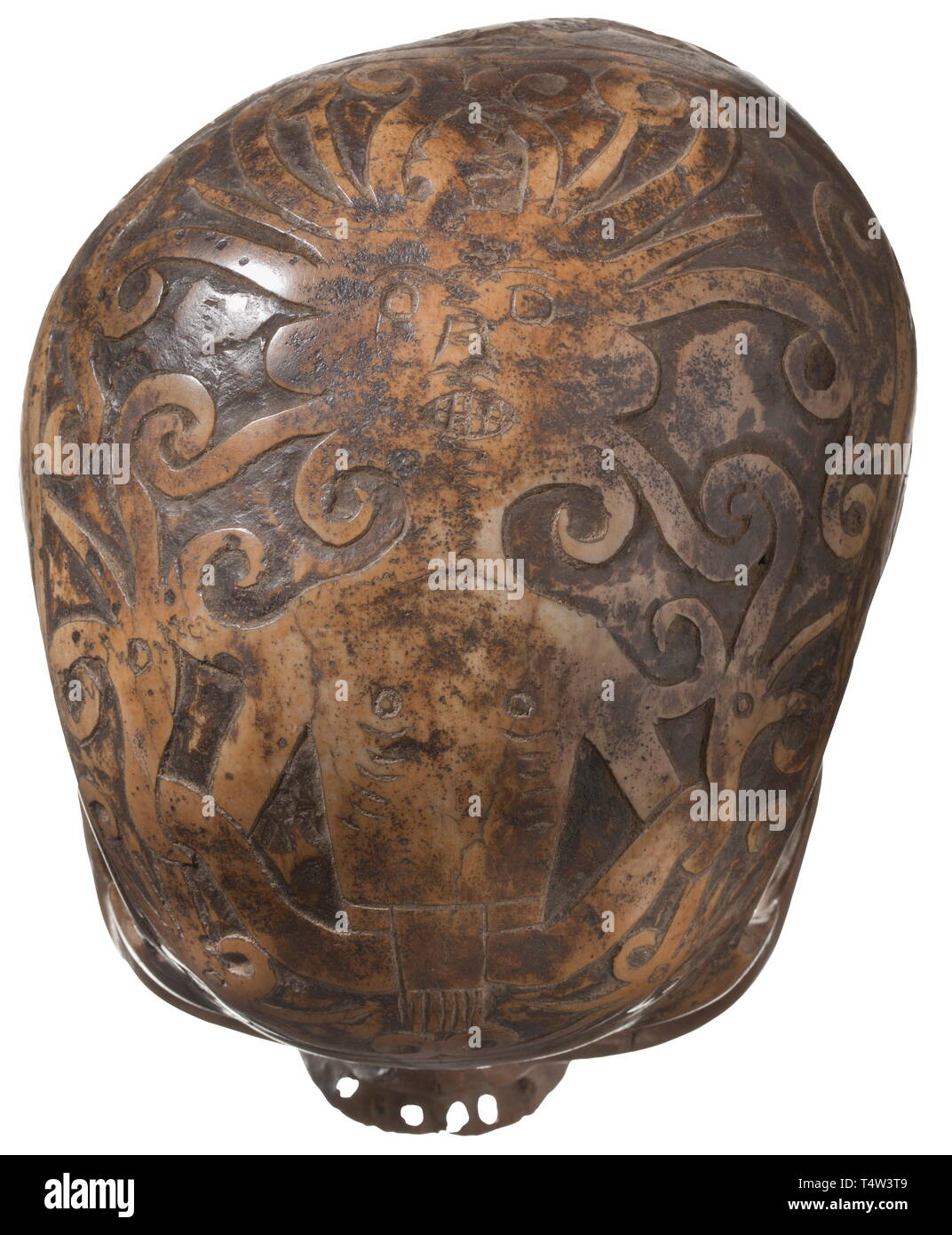 A trophy skull of the Dayak people, Borneo. Elaborately decorated skull ...