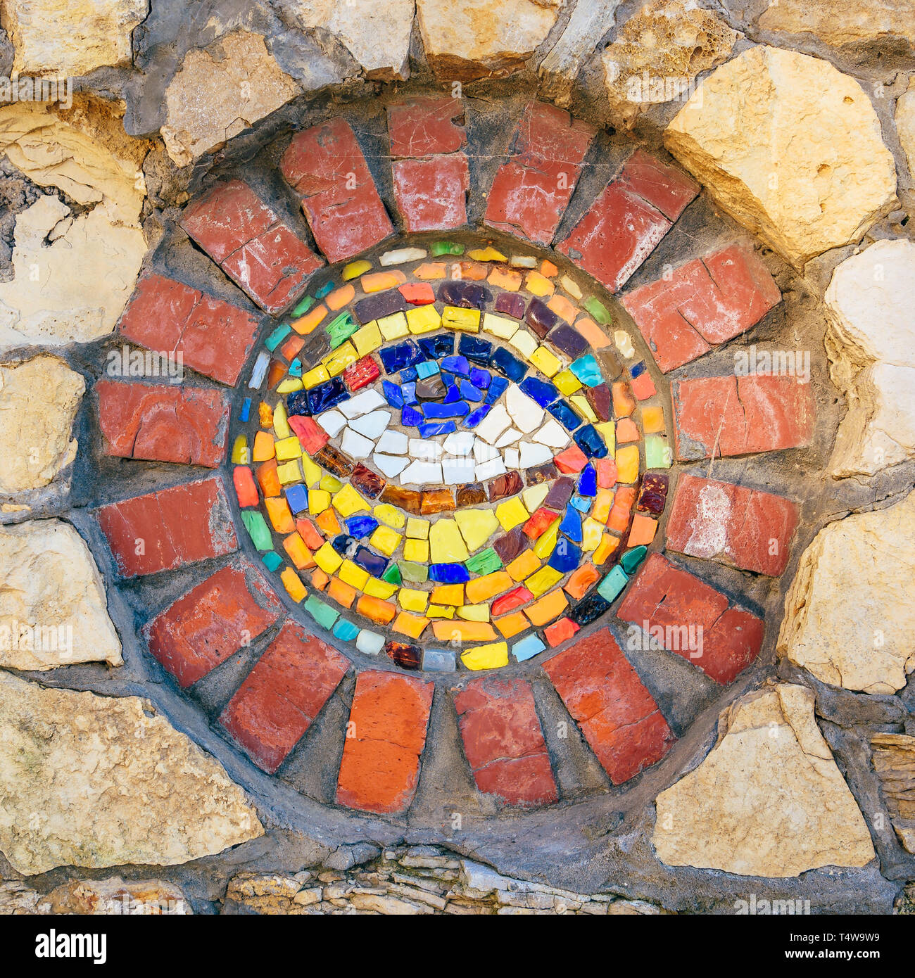Circular mosaic symbol Eye of Horus on stone wall Stock Photo - Alamy