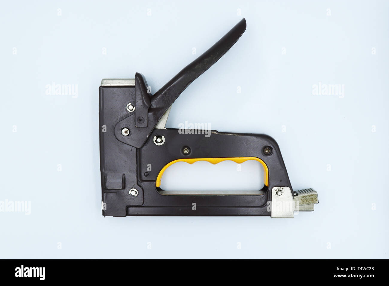 old steel stapler isolated on white background Stock Photo - Alamy