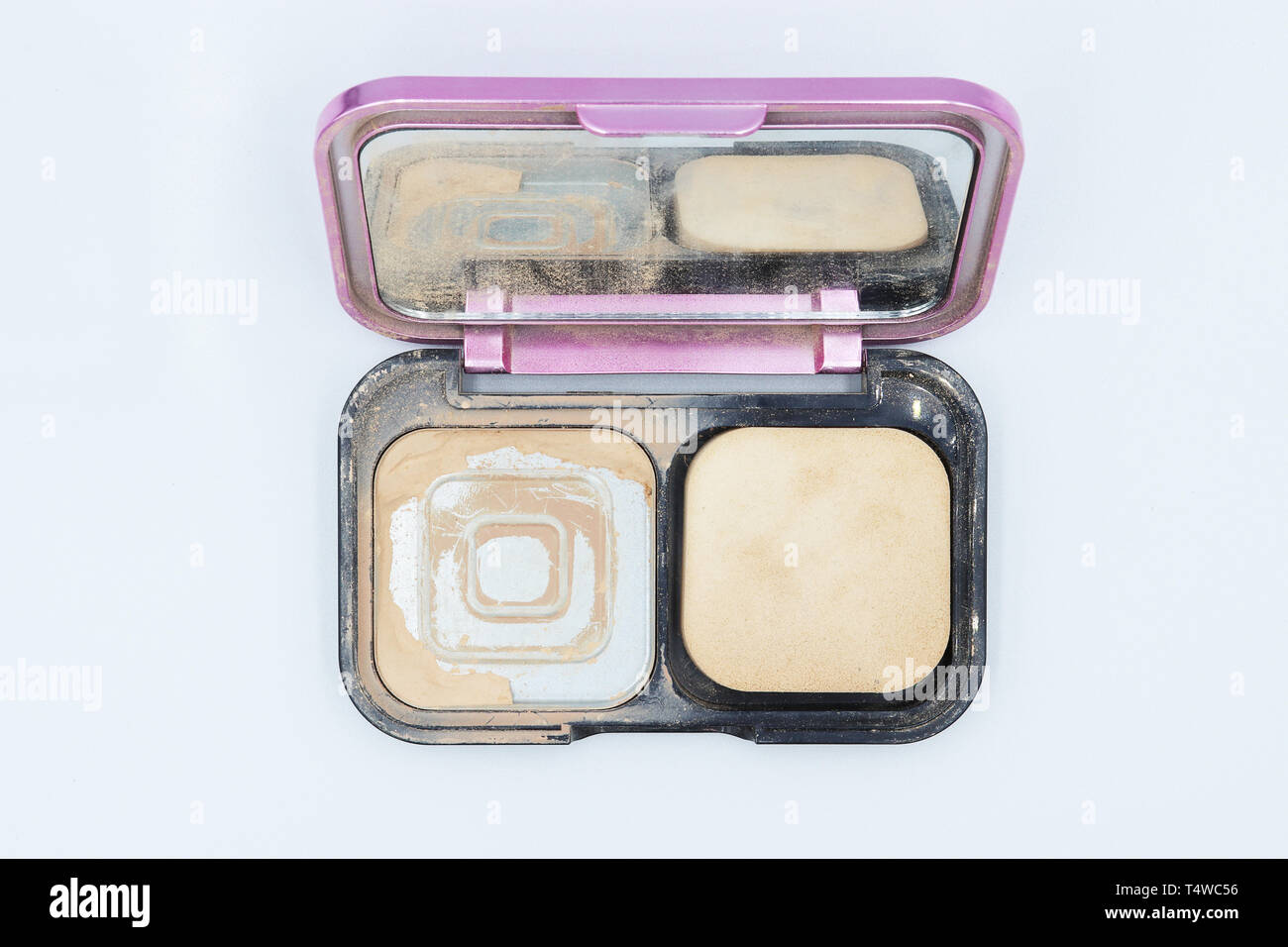 old pressed powder isolated on white background Stock Photo - Alamy