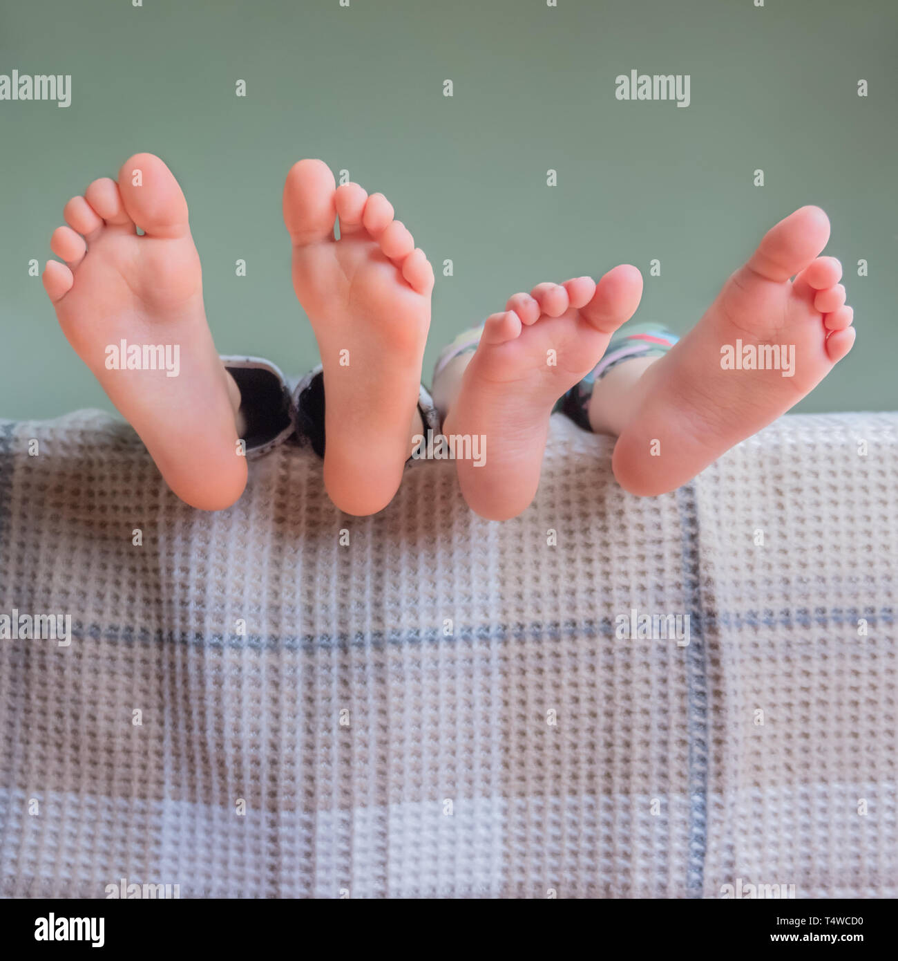 BareFeet of Kids. Toes and heels of two boys. Body part, foot. Softness ...