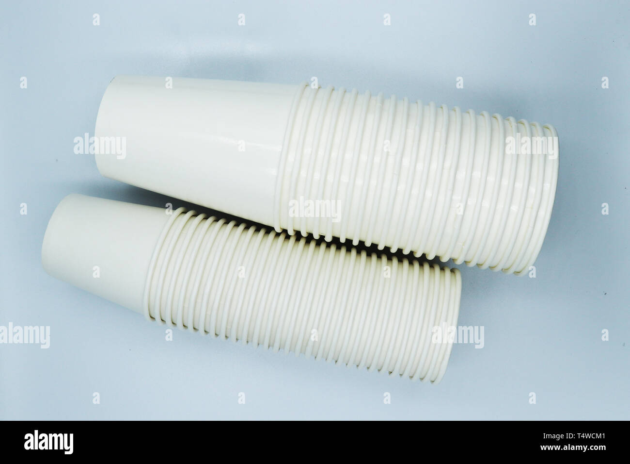 stack of paper cup isolated on white background Stock Photo - Alamy