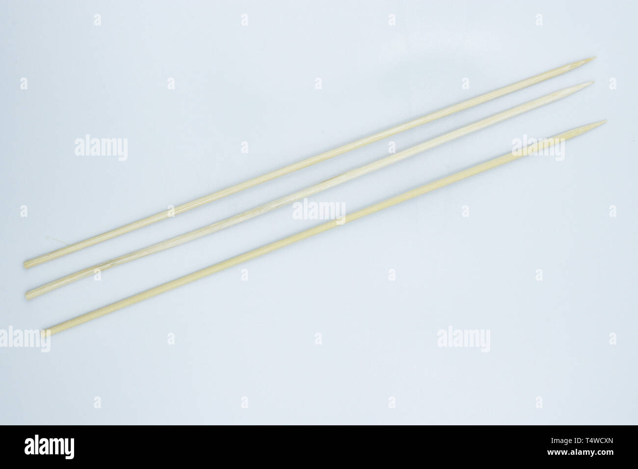 Sharp bamboo stick isolated on white background Stock Photo - Alamy
