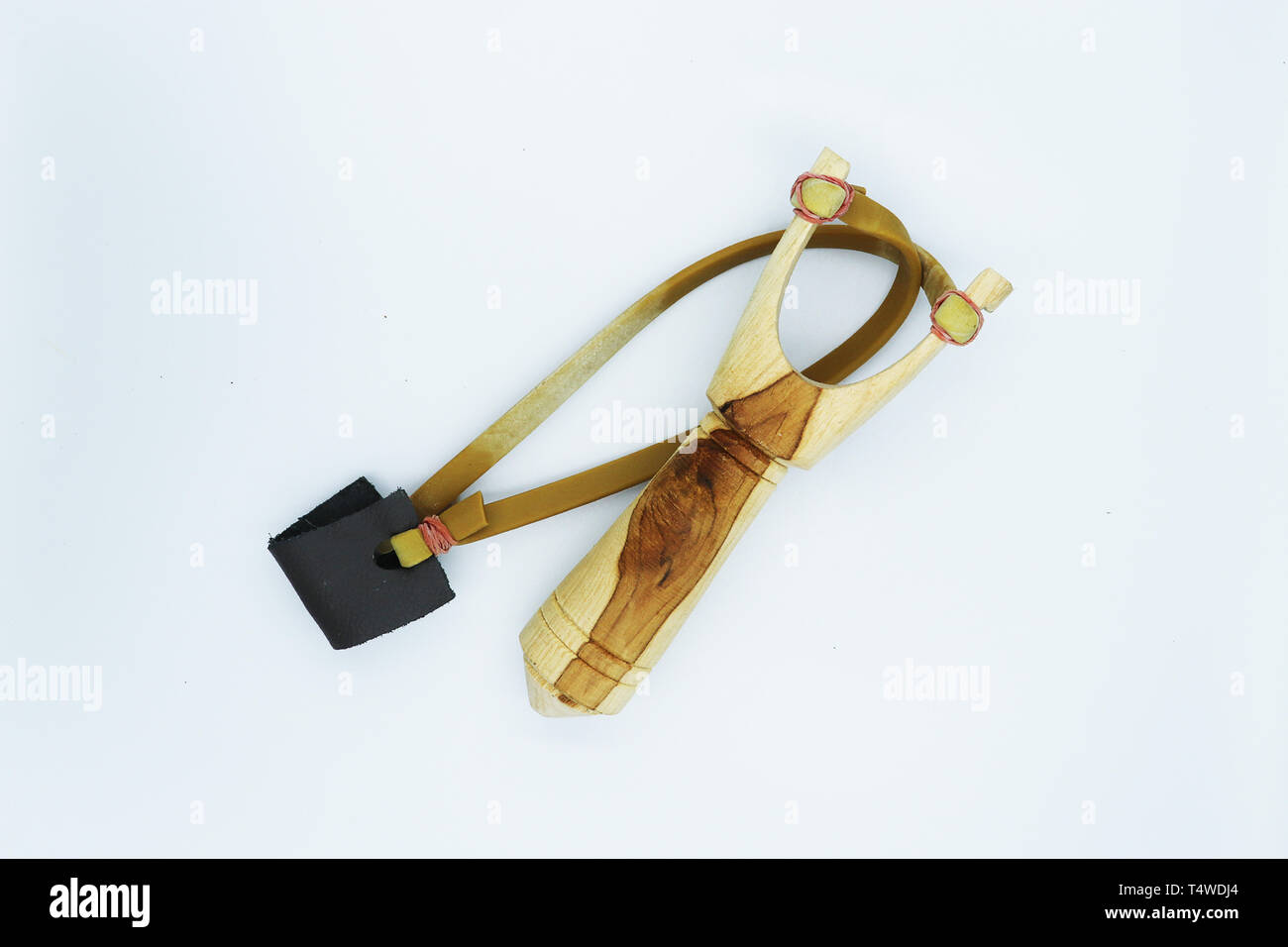 Catapult wood hand made isolated on white background Stock Photo - Alamy