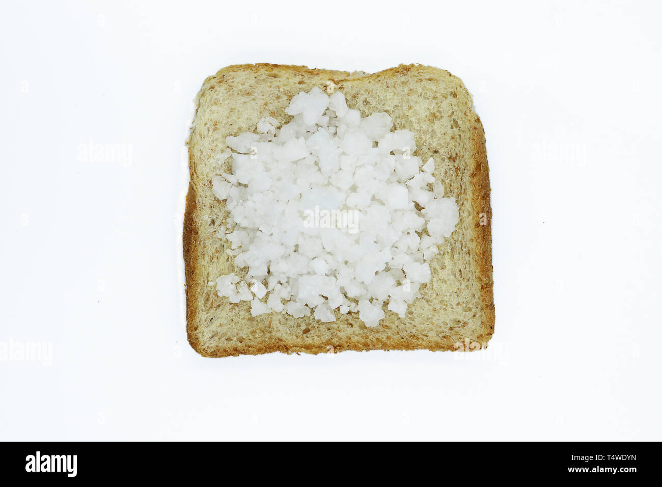 salt on slice breads isolated on white background Stock Photo - Alamy