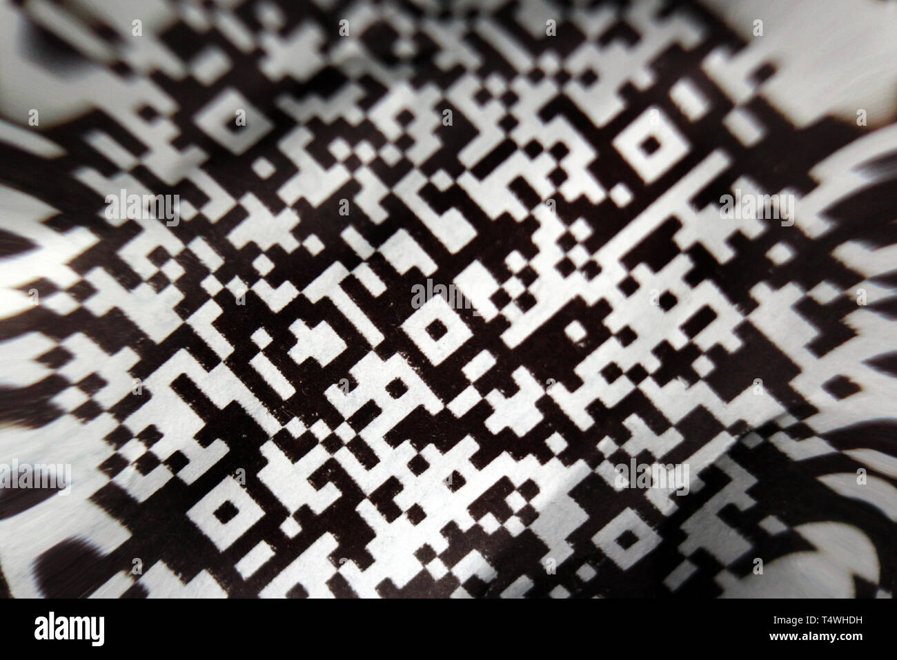 QR barcode distorted by lens, concept, close-up Stock Photo - Alamy
