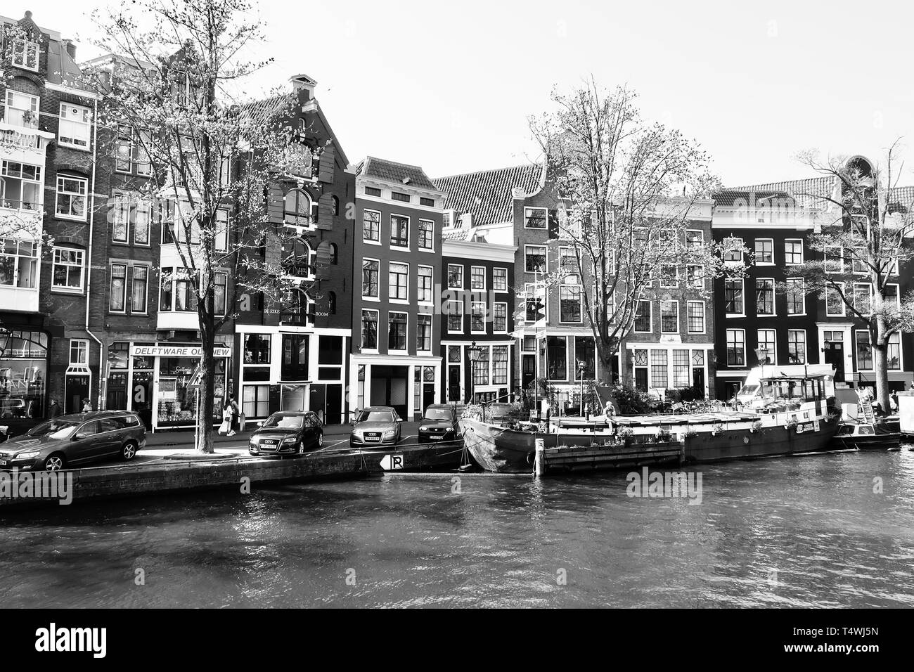 Amsterdam, Netherlands - April 2019: Typical Dutch tall canal side ...