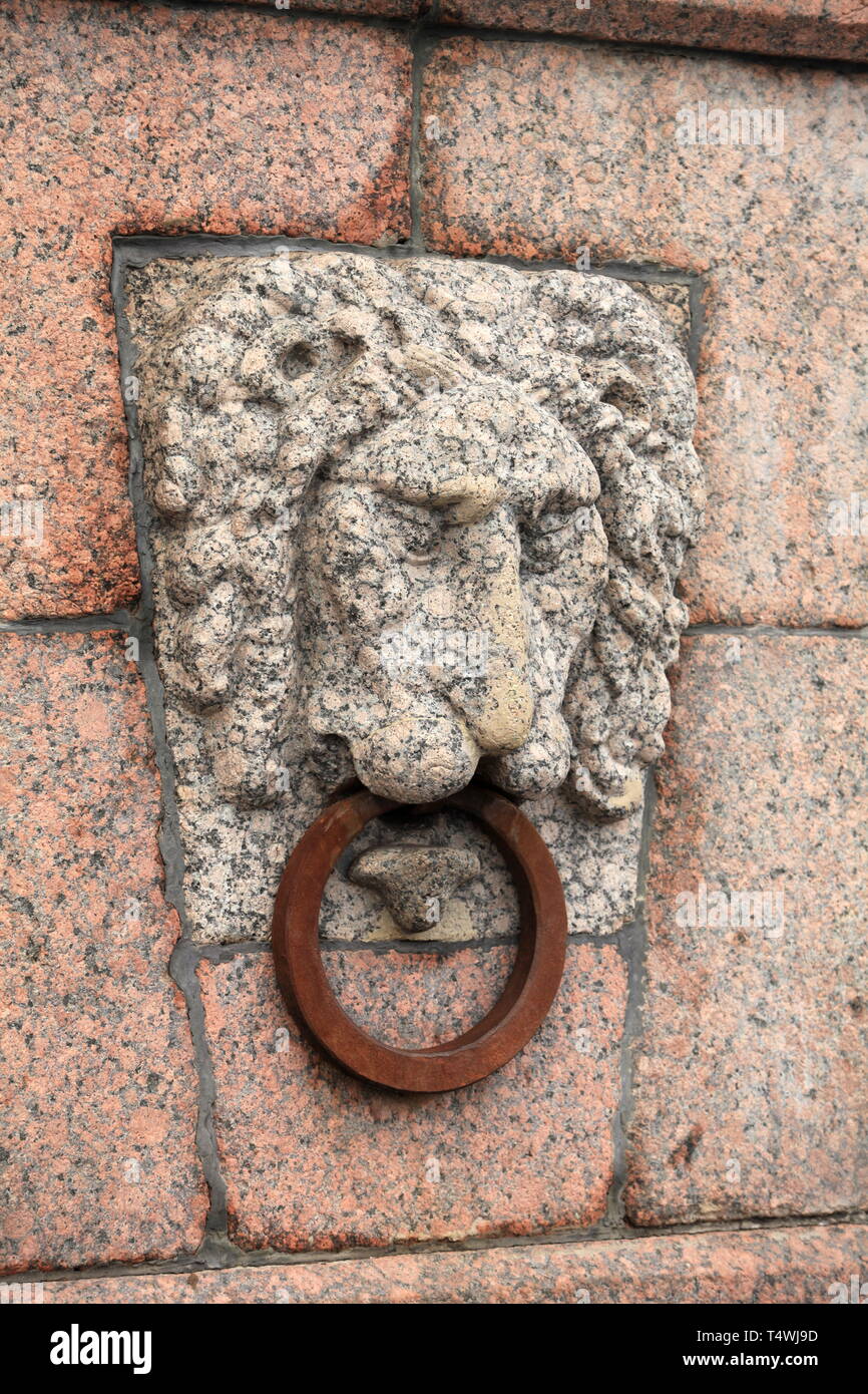 granite bas-relief of a lion's head on the quay Stock Photo - Alamy