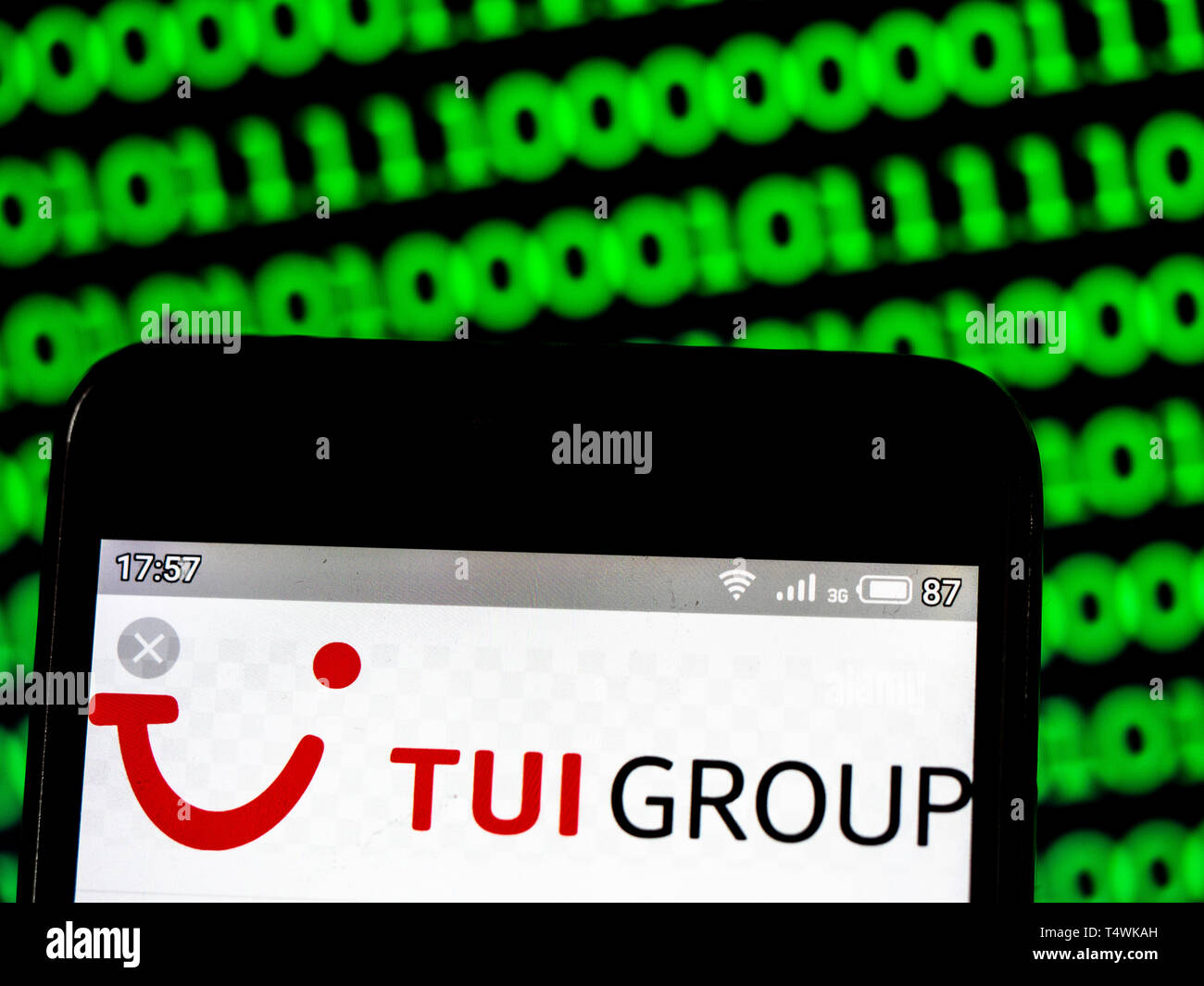 In this photo illustration a TUI Group logo seen displayed on a smart ...