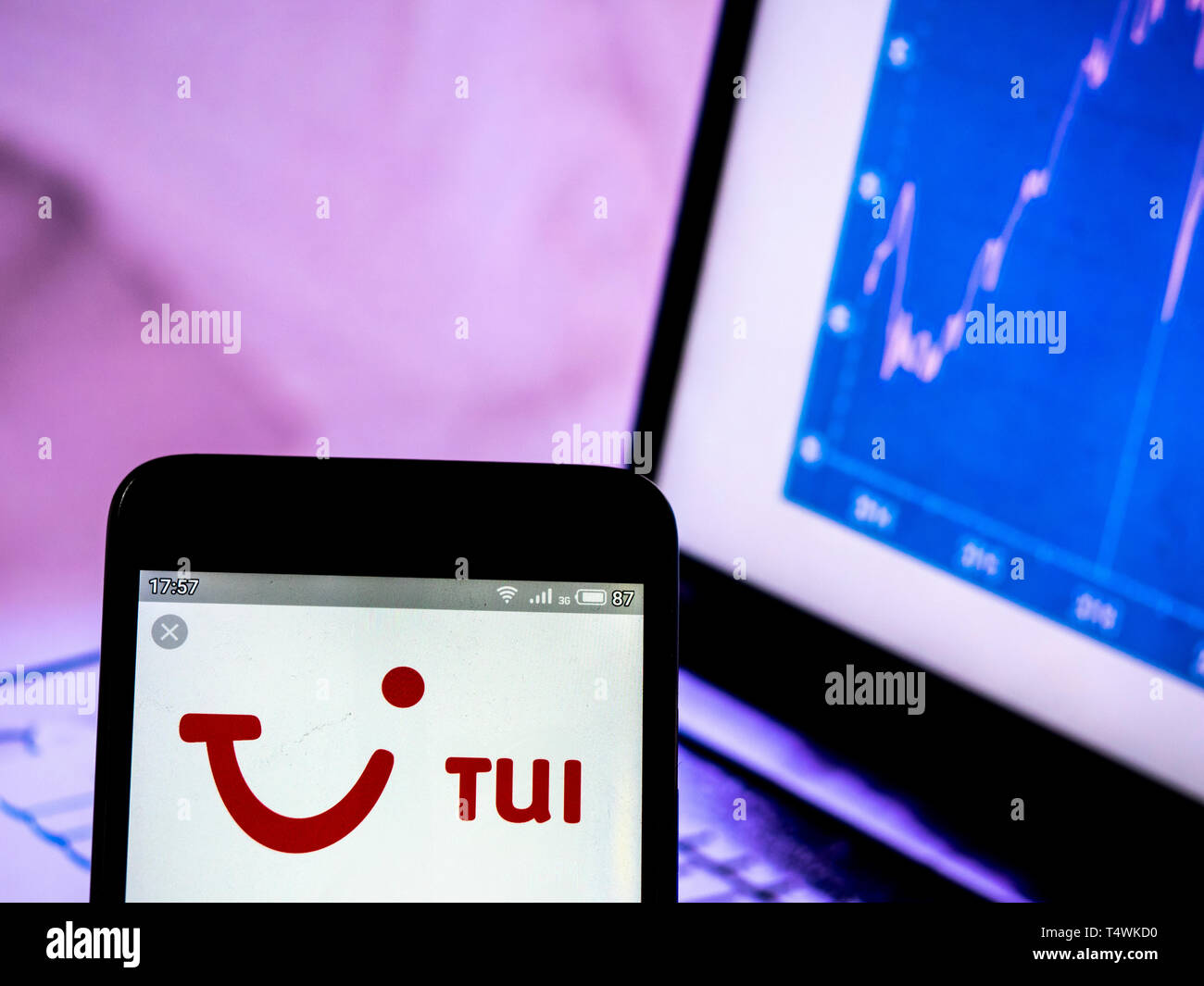 In this photo illustration a TUI Group logo seen displayed on a smart ...