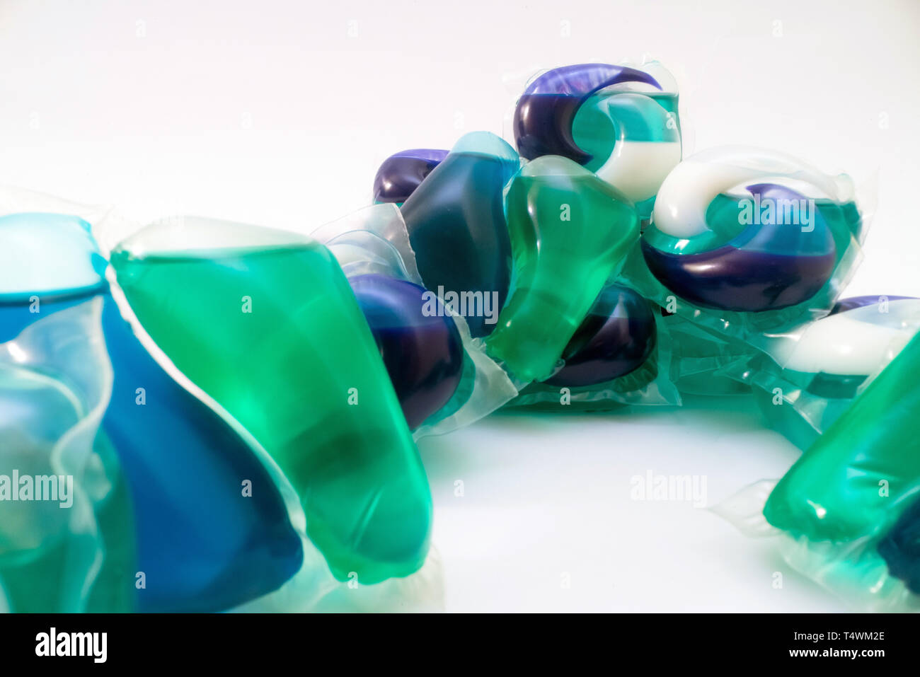 Washing gel capsules stack on white background Dissolving laundry ...