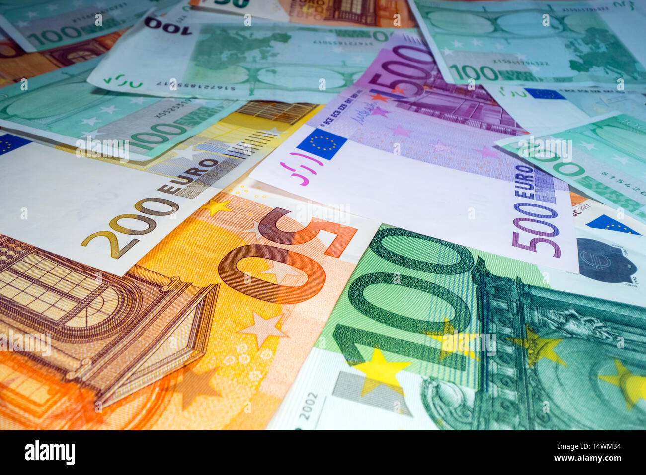 Wide angle view of euro notes background stacked on top of each other ...
