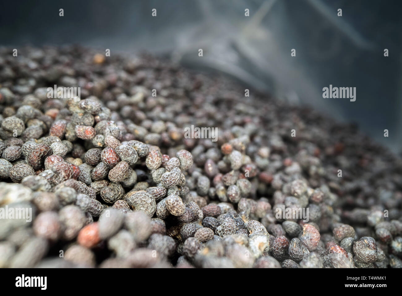 Inside the bag full of poppy seeds. Macro shot of dried pile of poppy ...