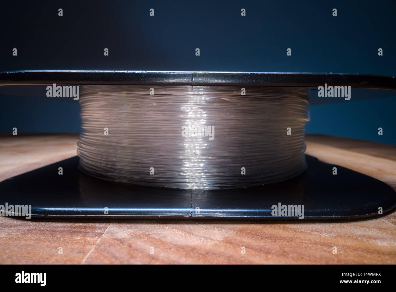 Macro shot of fishing line spool texture. Monofilament line wrapped on ...
