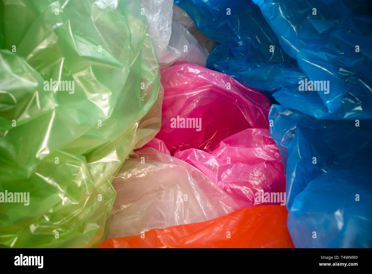 Disposable plastic bags background. Lightweight transparent, reusable ...