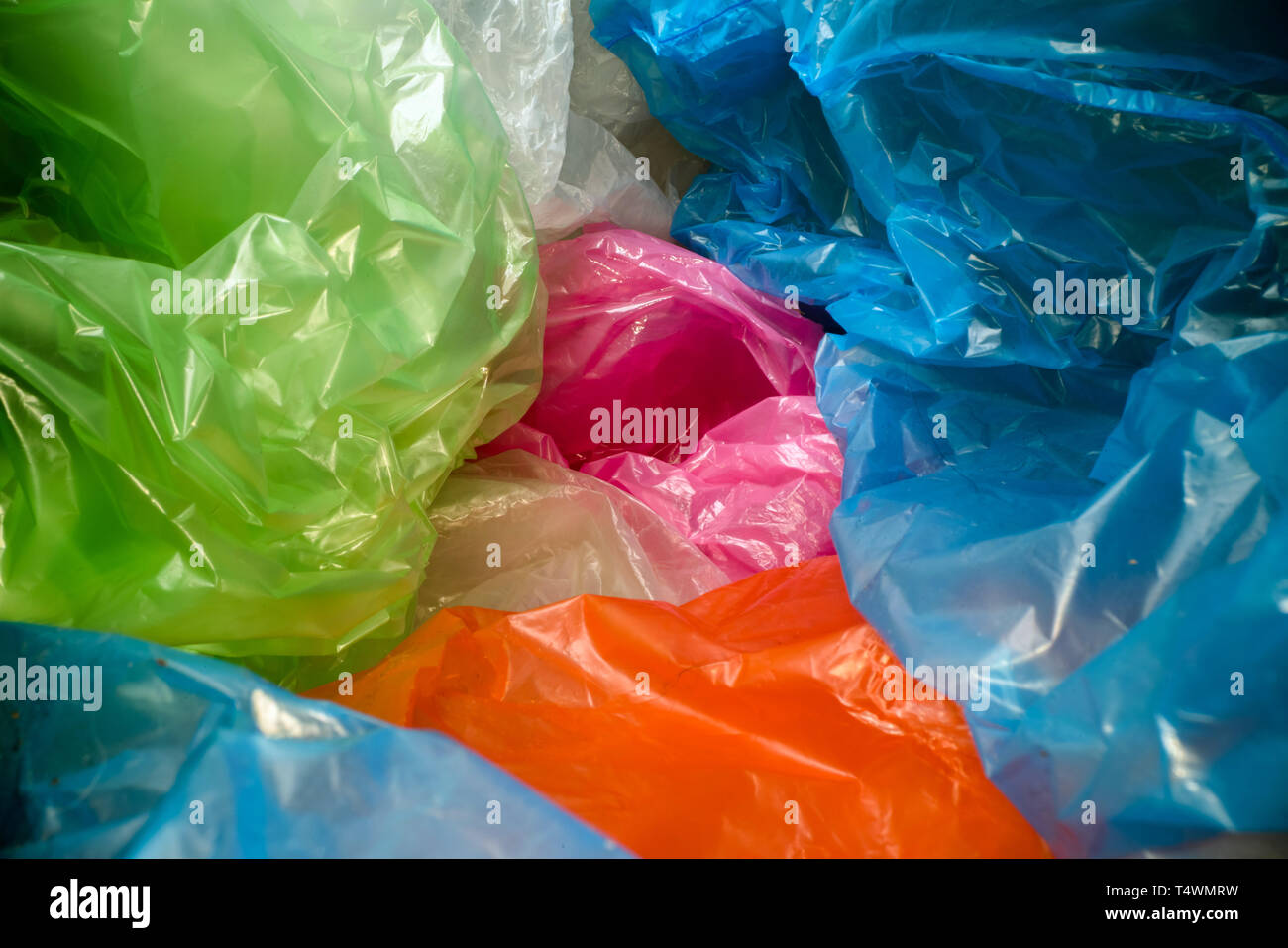 Disposable plastic bags background. Lightweight transparent, reusable plastic waste. Rubbish ...