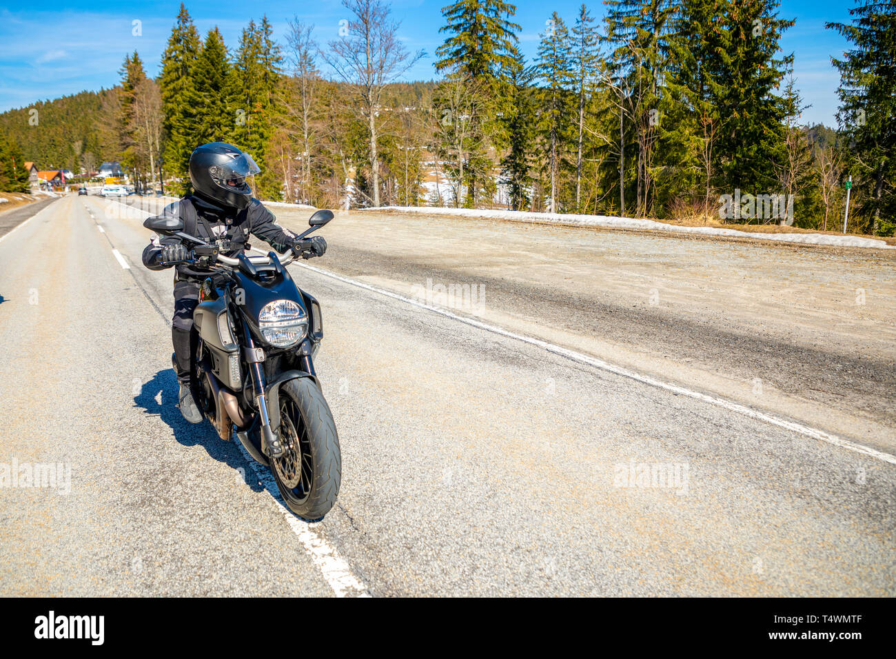 Grosser Arber, Germany - 30.03.2019: Motorcyclist biker riding ...