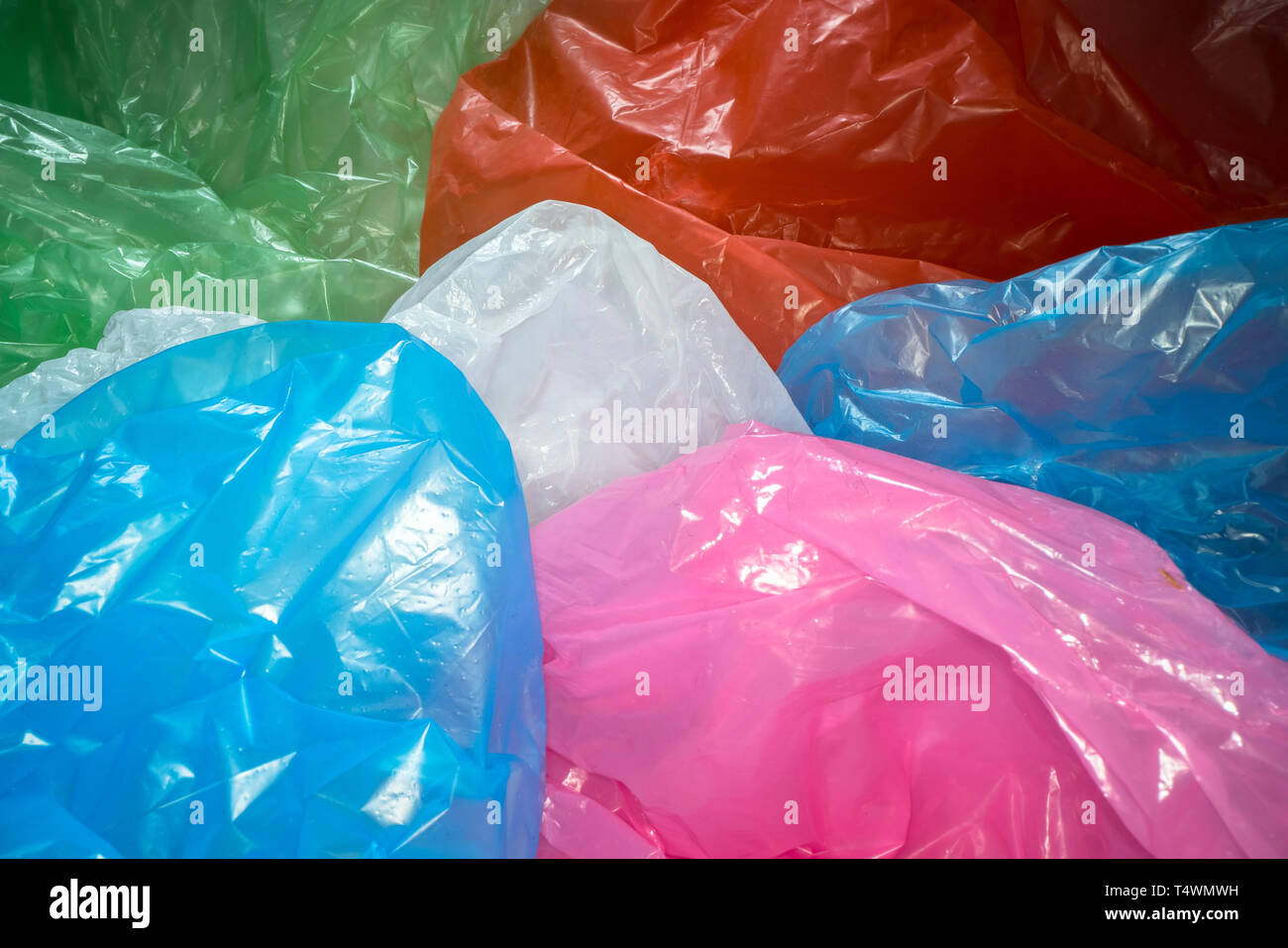 Disposable plastic bags background. Lightweight transparent, reusable ...