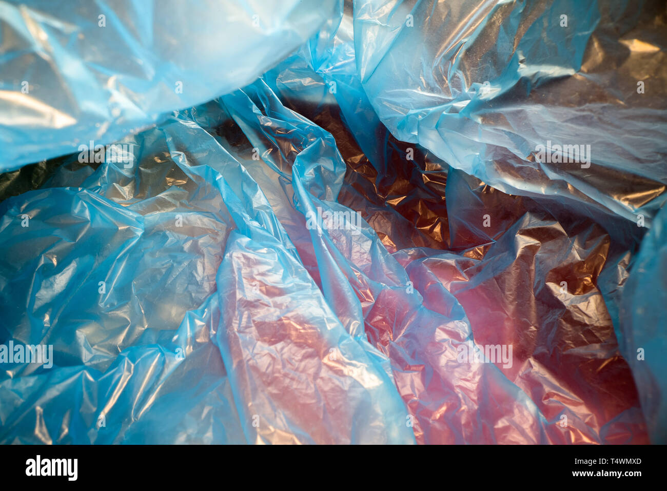 Inside a disposable plastic bag. Lightweight transparent, reusable plastic waste. Rubbish bag ...