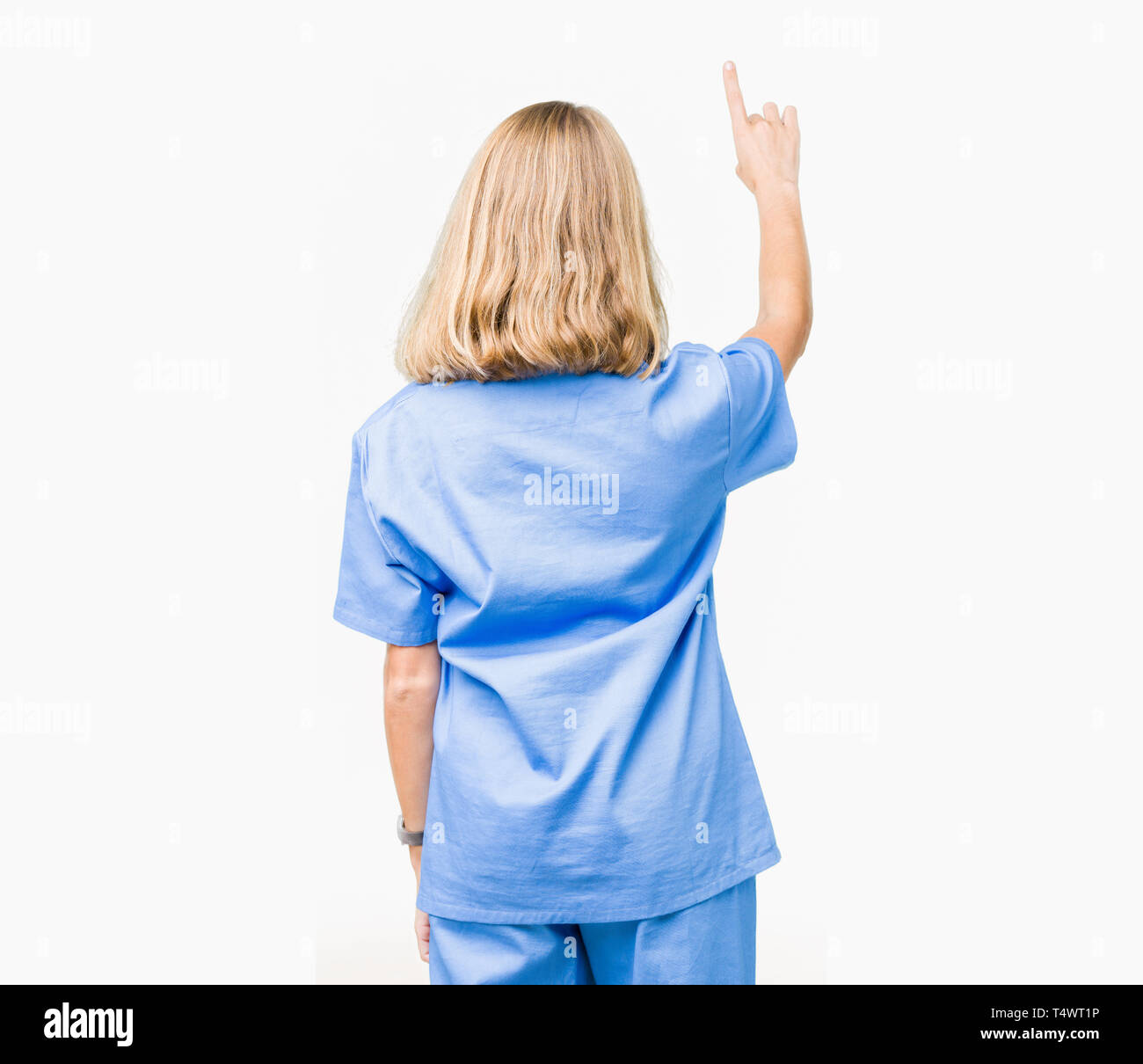 Beautiful young doctor woman wearing medical uniform over isolated ...