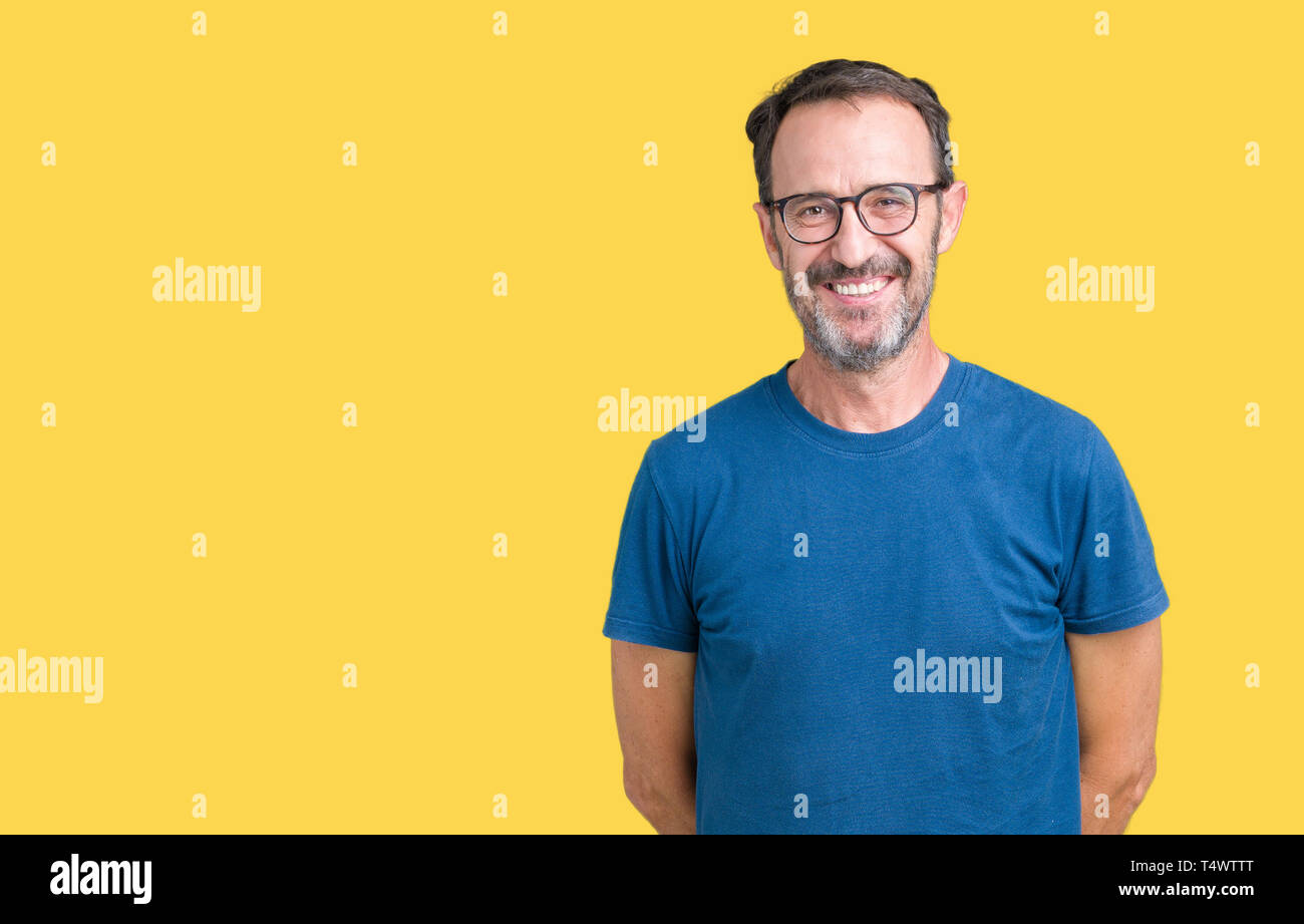 Handsome middle age hoary senior man wearin glasses over isolated ...