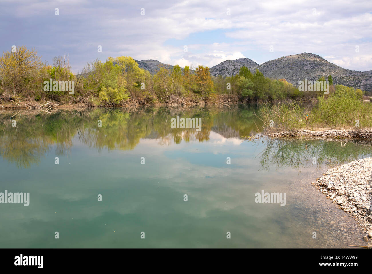 River Moraca landscape, Montenegro. Clouds reflections in the water ...