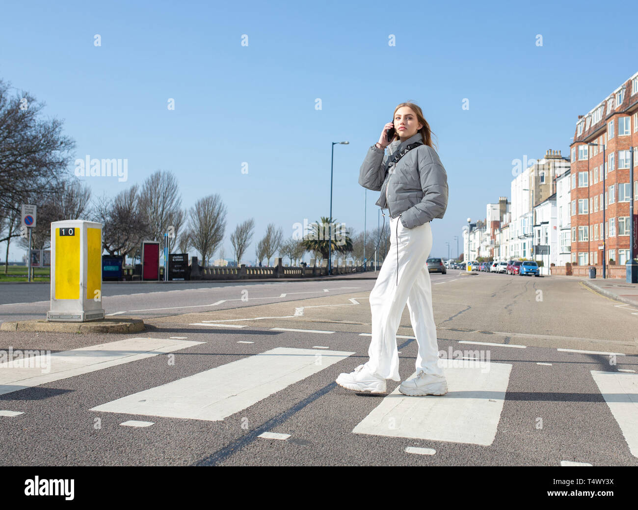 Girl crossing a street hi-res stock photography and images - Alamy