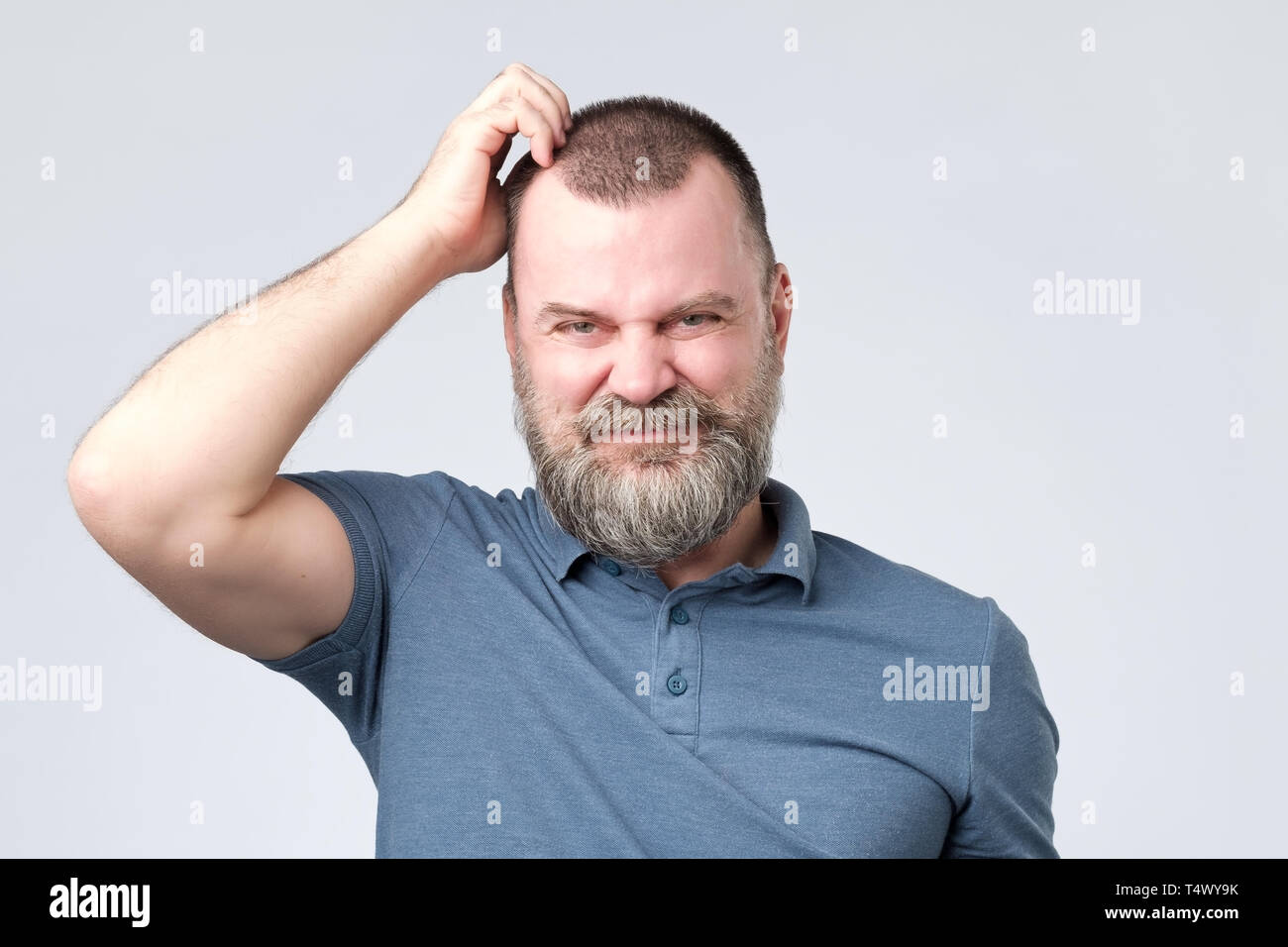 Confused smile hi-res stock photography and images - Alamy