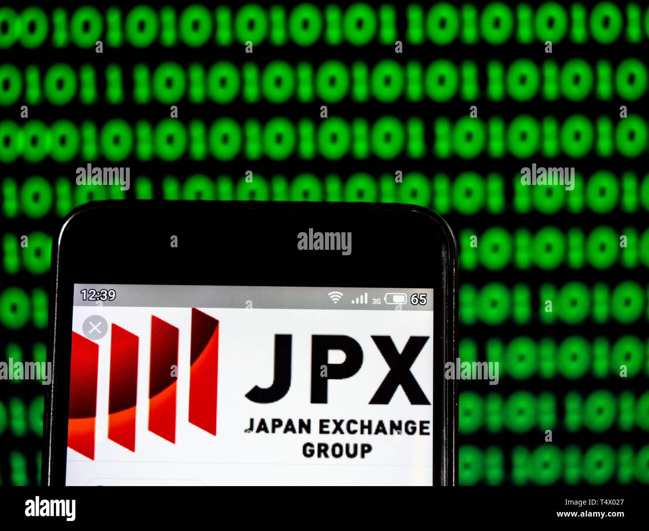 In this photo illustration a Japan Exchange Group, Inc. seen displayed ...
