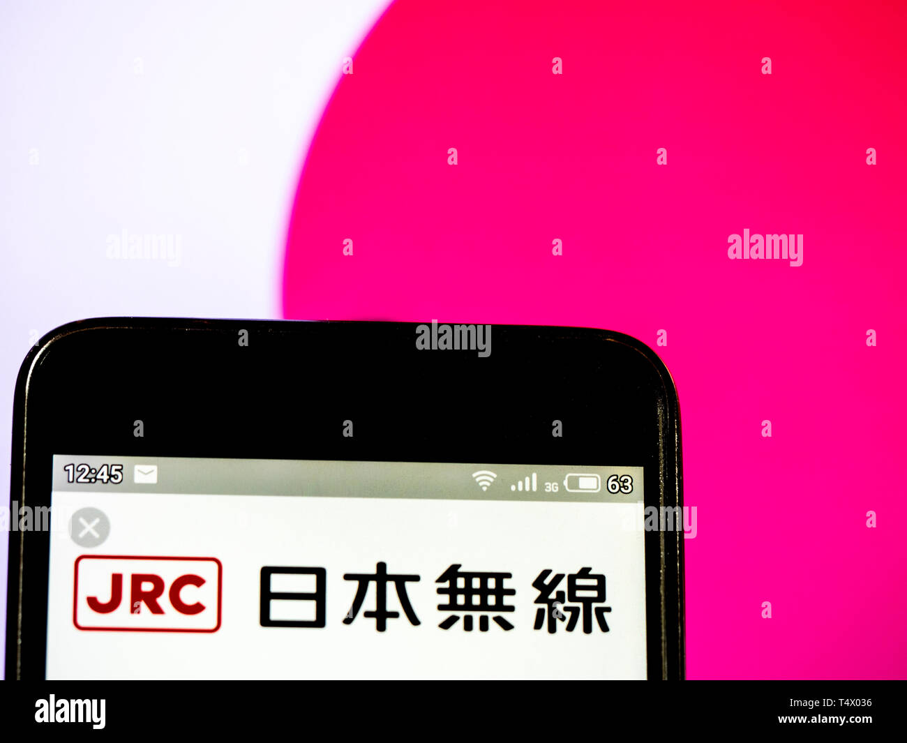 In this photo illustration a Japan Radio Company seen displayed on a ...