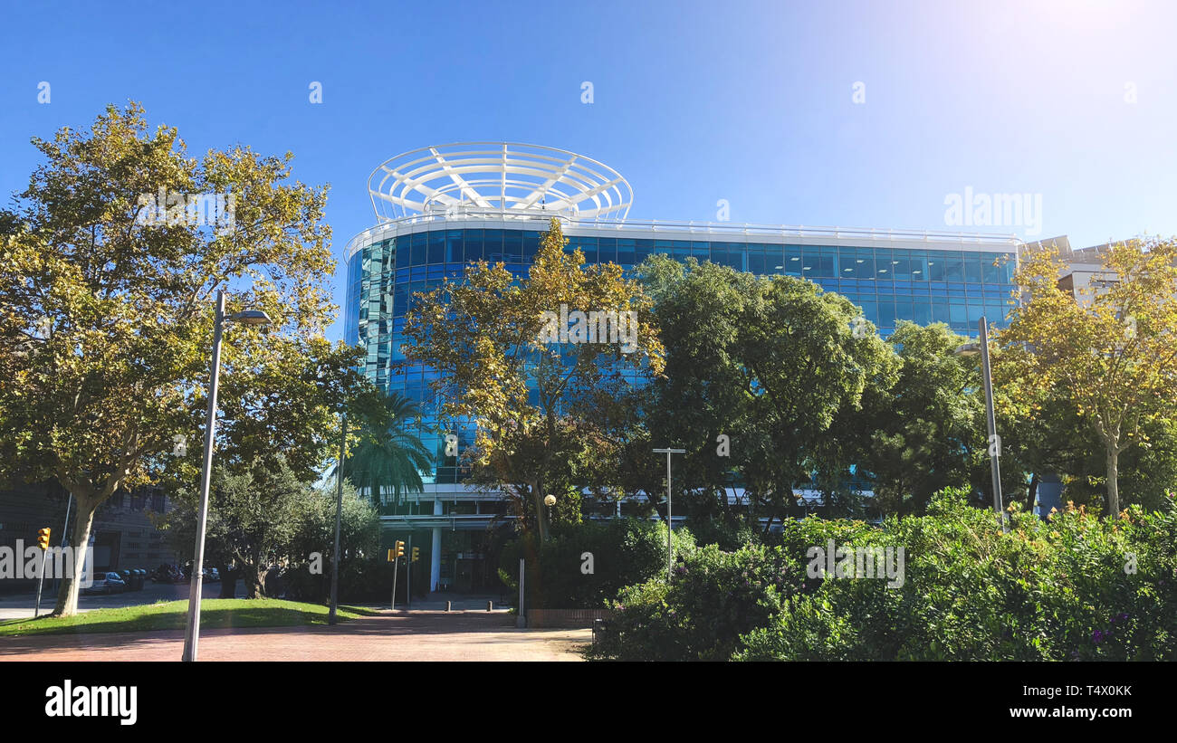 Modern glass facade. Office building with trees Stock Photo - Alamy