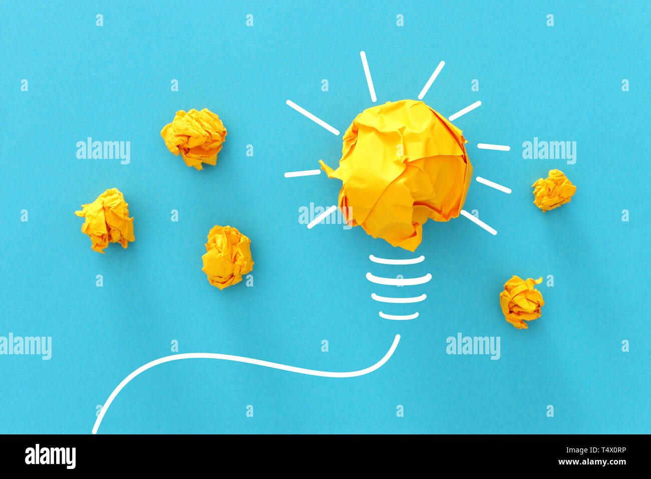 concept image of successful idea, crumpled paper and light bulb sketch ...