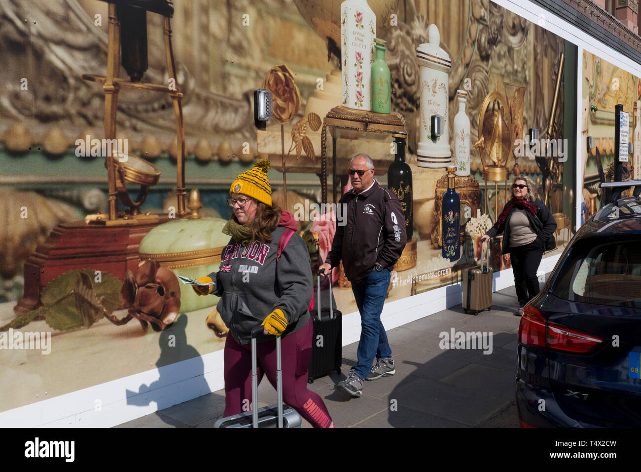 The temporary hoarding wrapped around the read of the Harrods ...