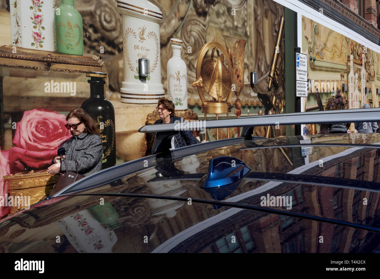 The temporary hoarding wrapped around the read of the Harrods ...