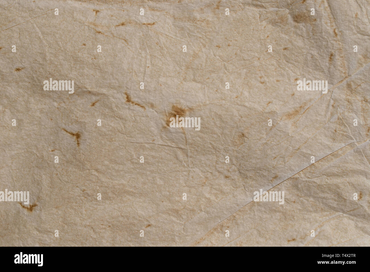 old stained paper background texture macro Stock Photo - Alamy
