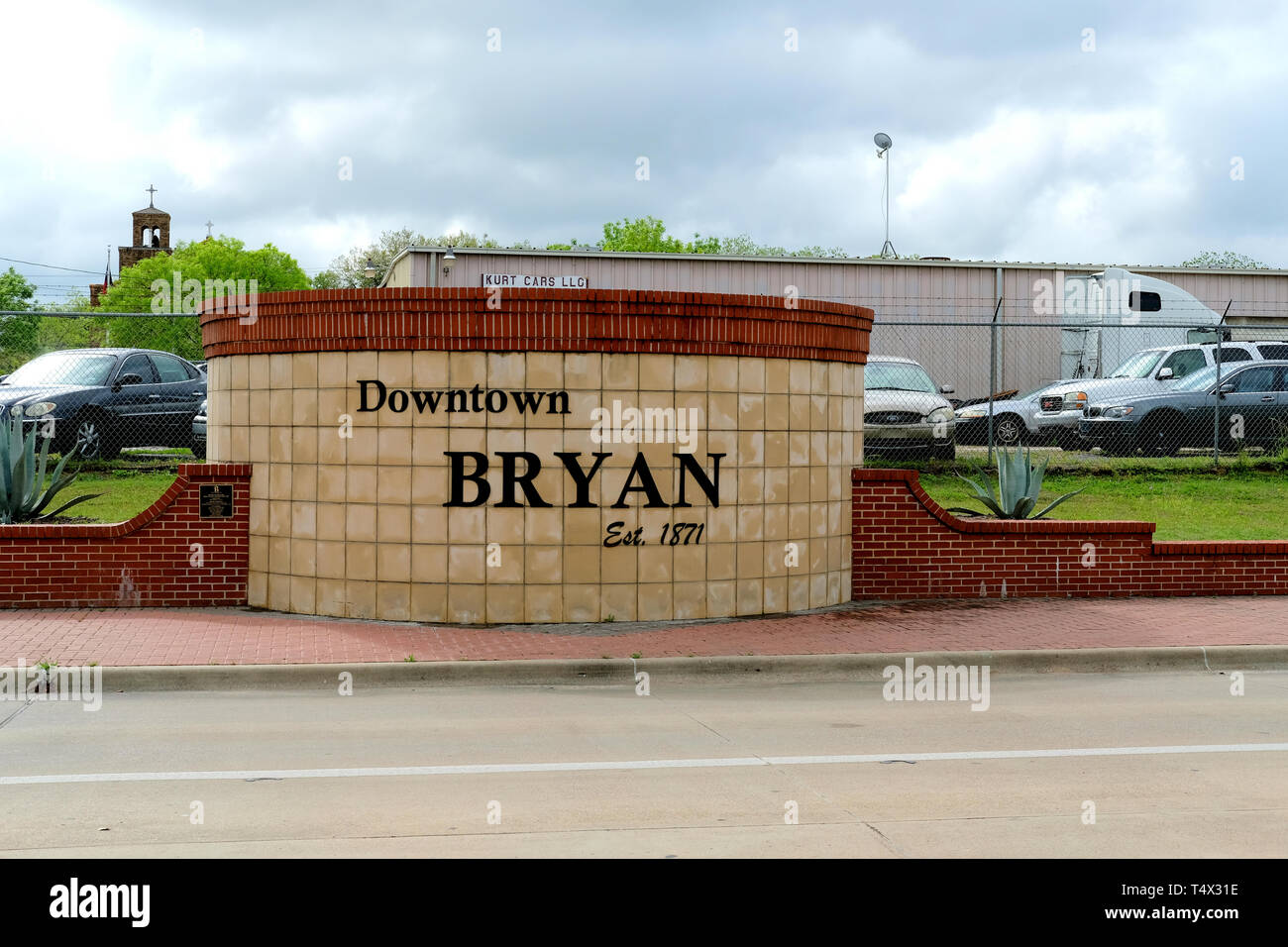 Downtown Bryan Est. 1871 on a brick and patterned concrete structure ...