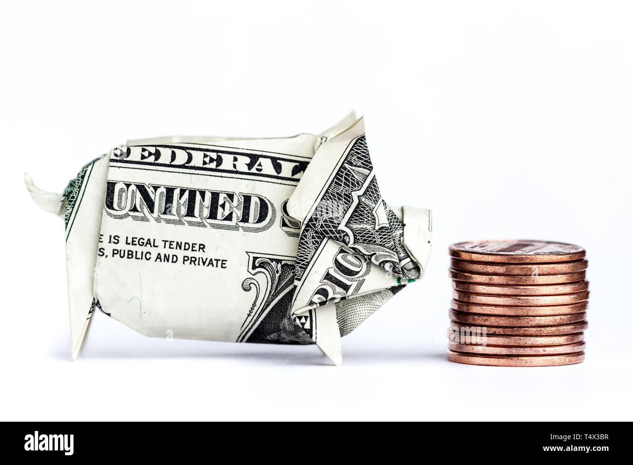 Money shaped like a pig Stock Photo - Alamy